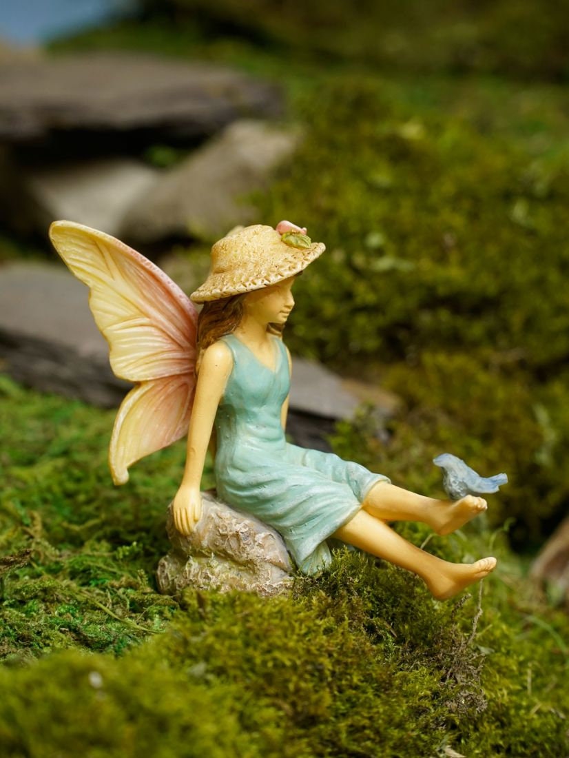 Girl Fairy with Bluebird Perched on Her Toes